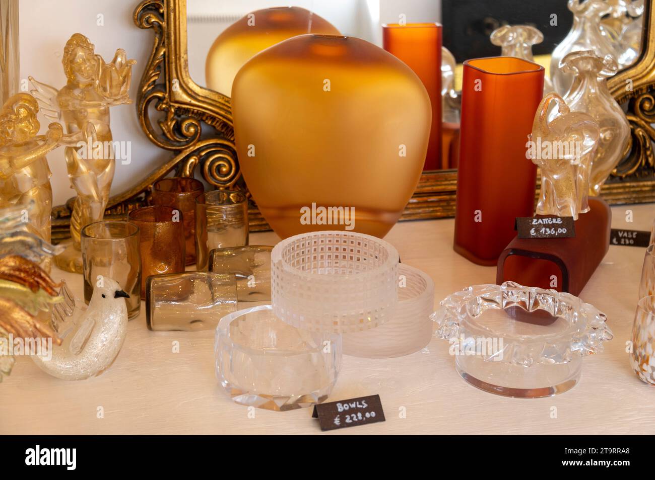 A shop display of hand-crafted cut glassware on sale at the Wave Murano ...