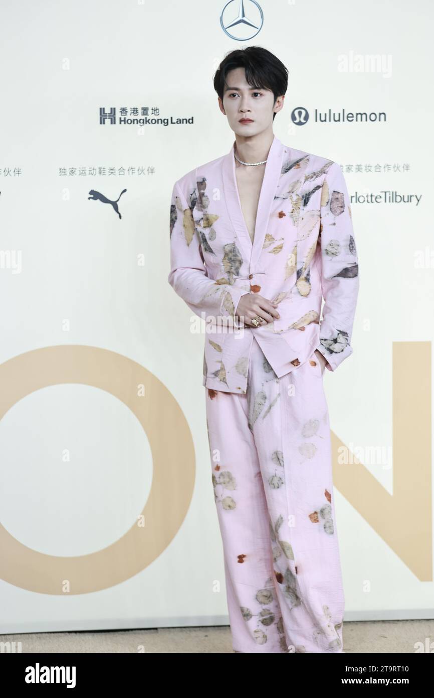 Chinese actor, singer, and dancer Tan Jianci attends the VOGUE activity ...