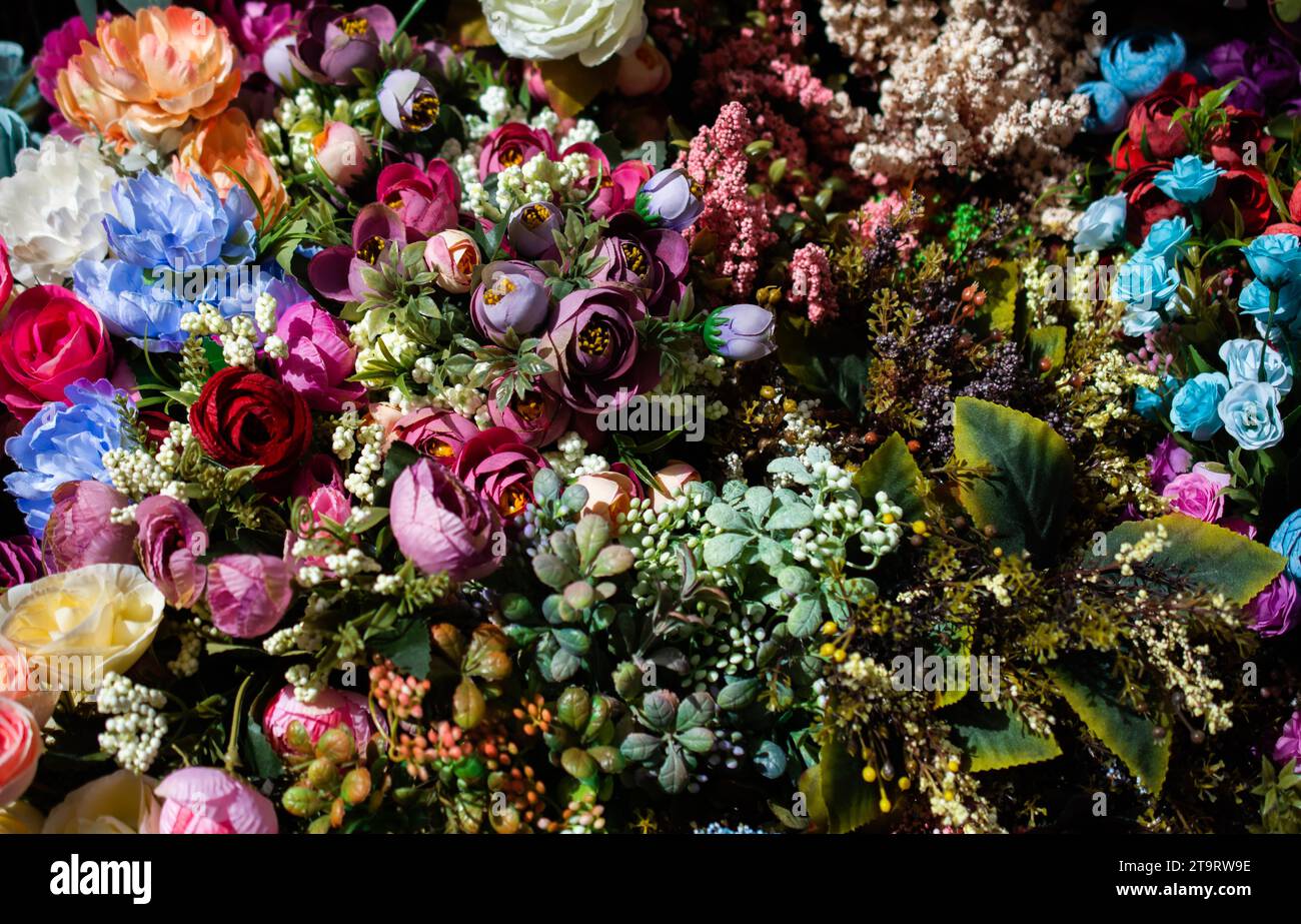 Floral art made of colorful artificial flowers in view Stock Photo - Alamy