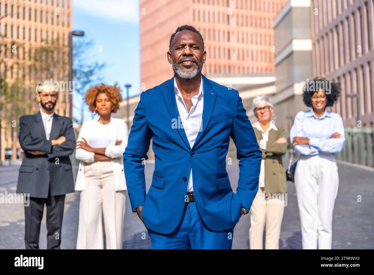 African woman next building hi-res stock photography and images - Alamy