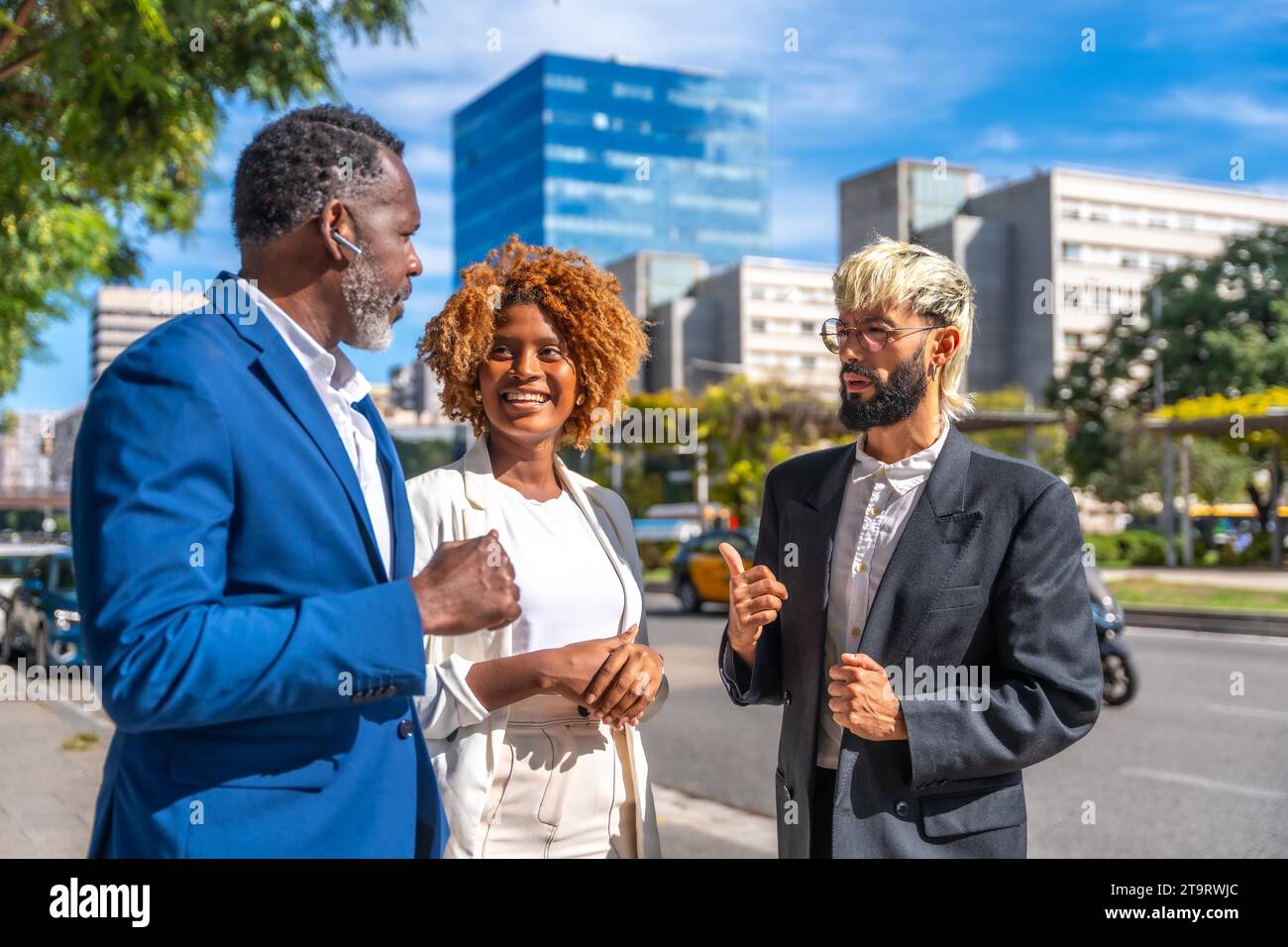 Multicultural business people in elegant clothes and suit talking on ...