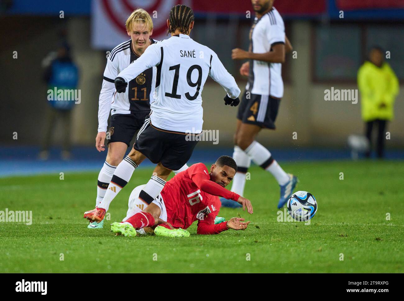 Leroy SANE, DFB 19 compete for the ball, tackling, duel, header ...