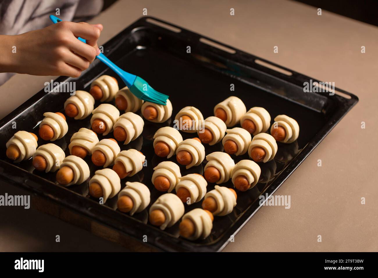 Pigs in a blanket, traditional festive Christmas food on the baking ...