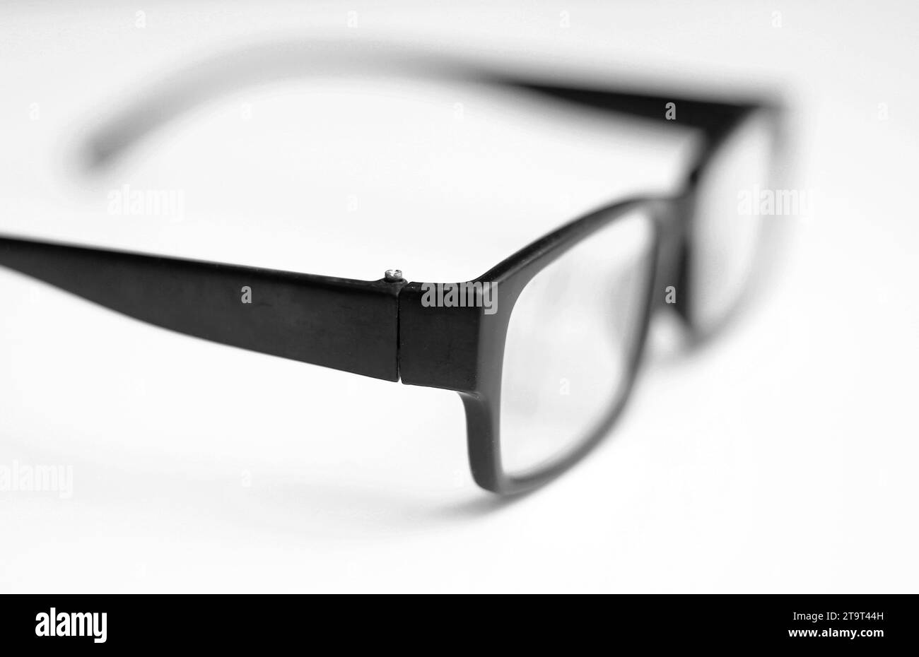 glasses on display at an optician shop white background stock image ...