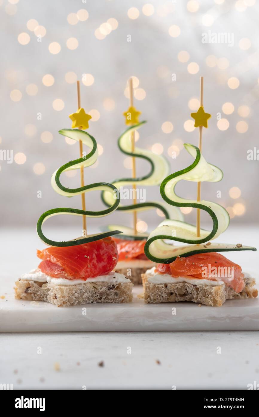 Christmas tree canape with cucumber slice and salmon for festive ...