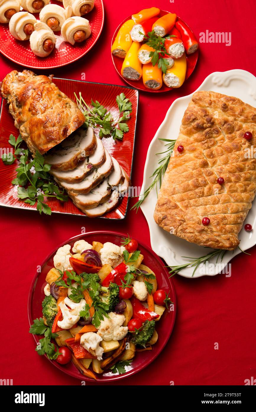 Traditional festive Christmas dishes on the table. Wellington with ...