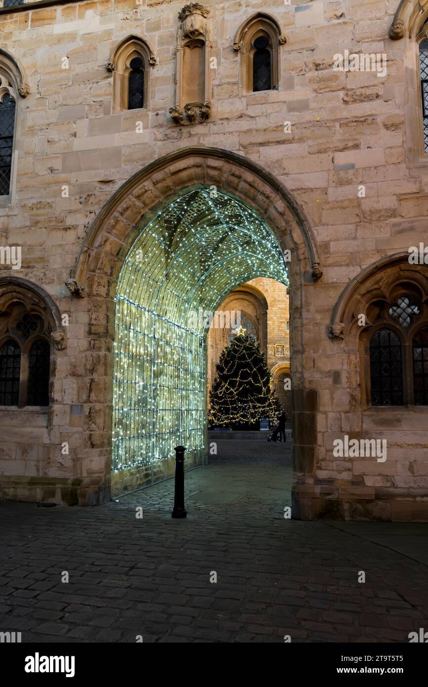 View through illuminated arch to Christmas tree, Exchequer Gate ...