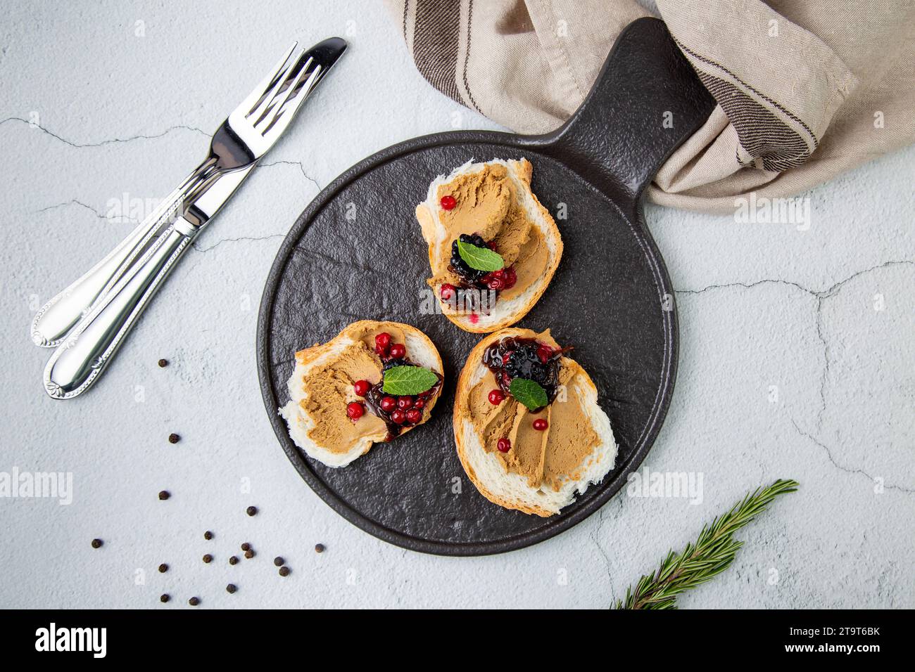 canapes with pate, mint leaves and berries, top view Stock Photo - Alamy