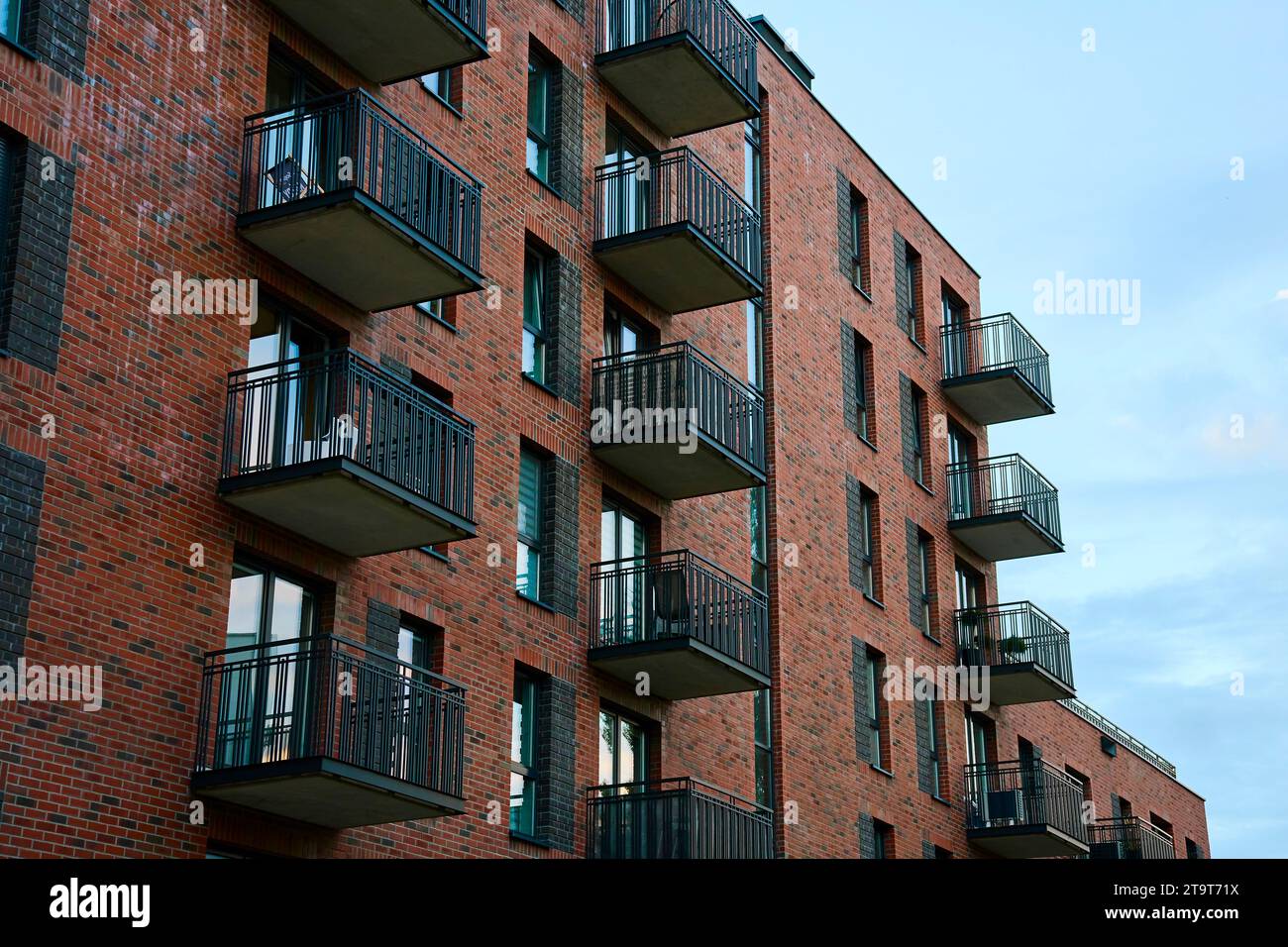 Residential building facade with balconies and windows. Modern city ...