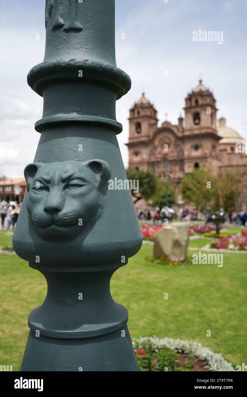 A Puma face moulded into a lamp post at Plaza De Armas with Church ...