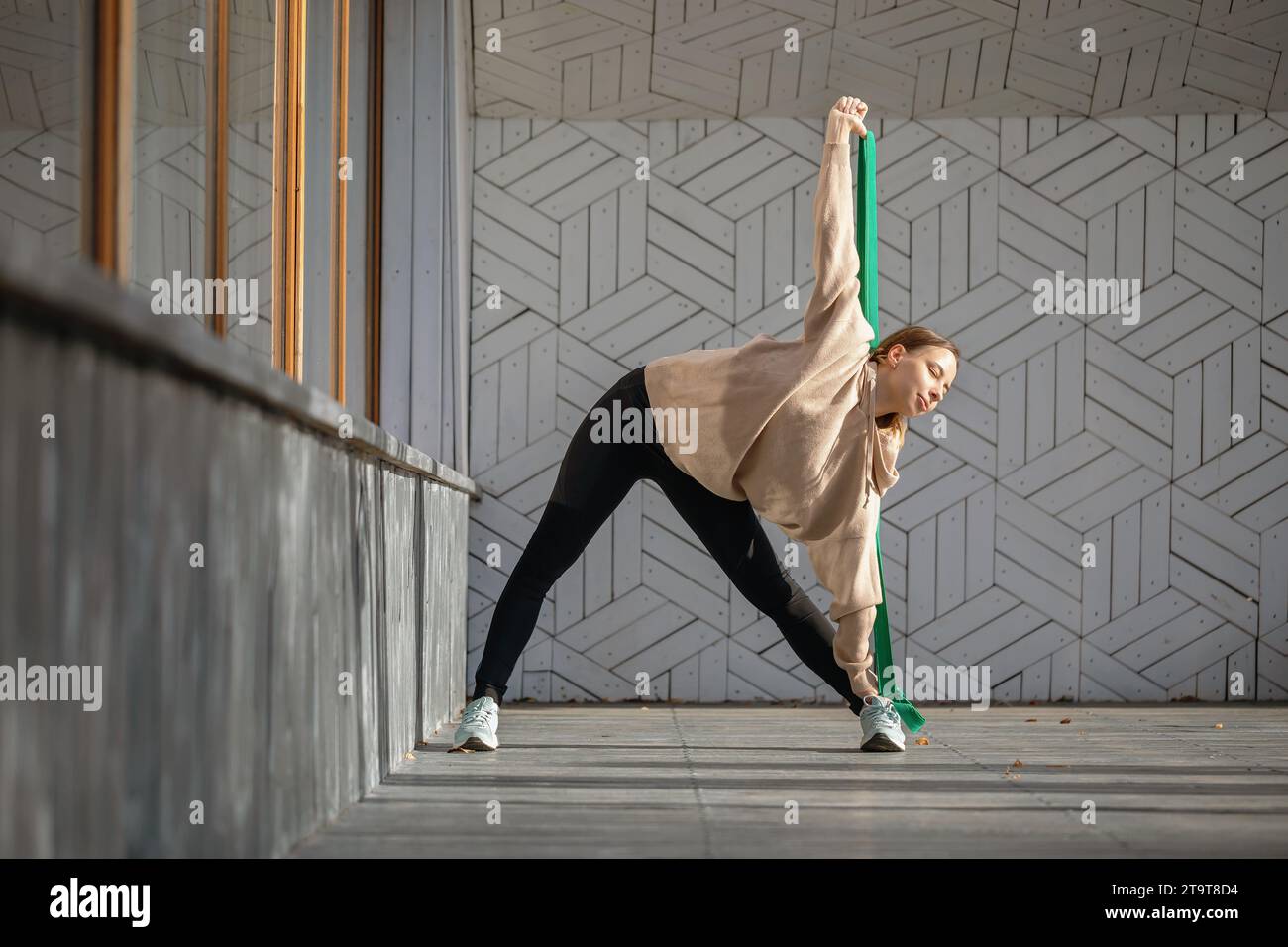Woman in the triangle pose hi-res stock photography and images - Alamy