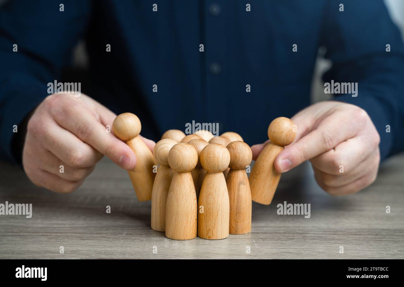 Pull out people from a group of figures. Gather in a new team ...