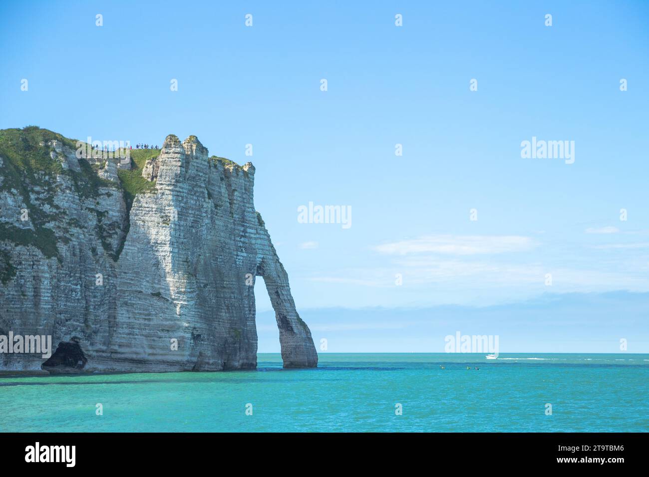 Elephant like white sea cliff with sapphire blue sea in the background ...