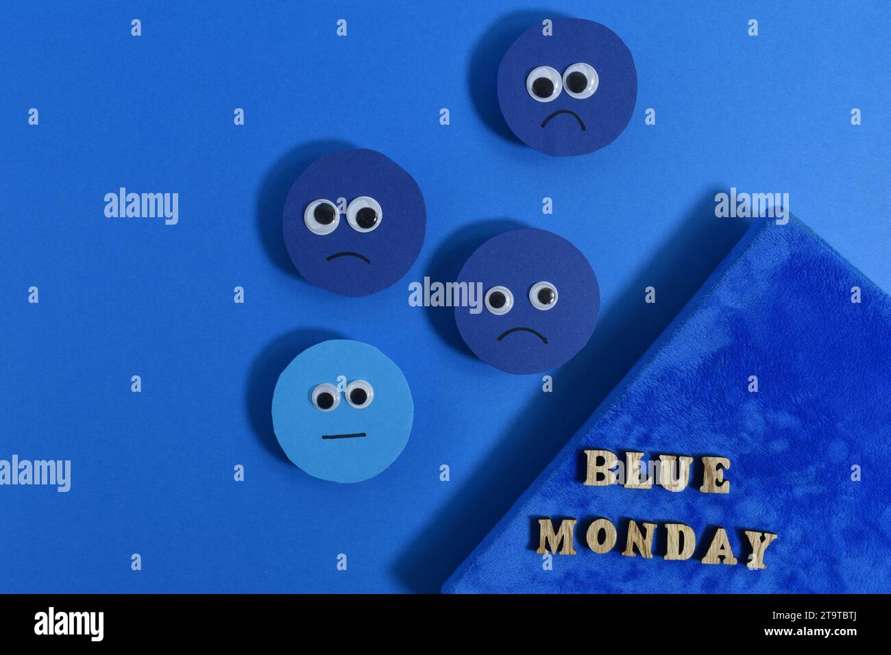 Blue Monday concept. Sad faces and blue diary Stock Photo - Alamy
