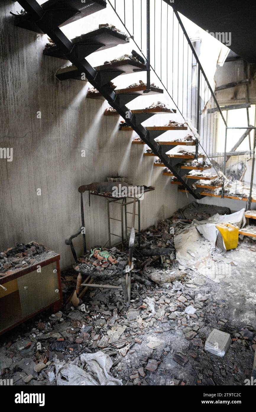 Beeri, Israel. 27th Nov, 2023. A doll lies on a rocking chair in a ...