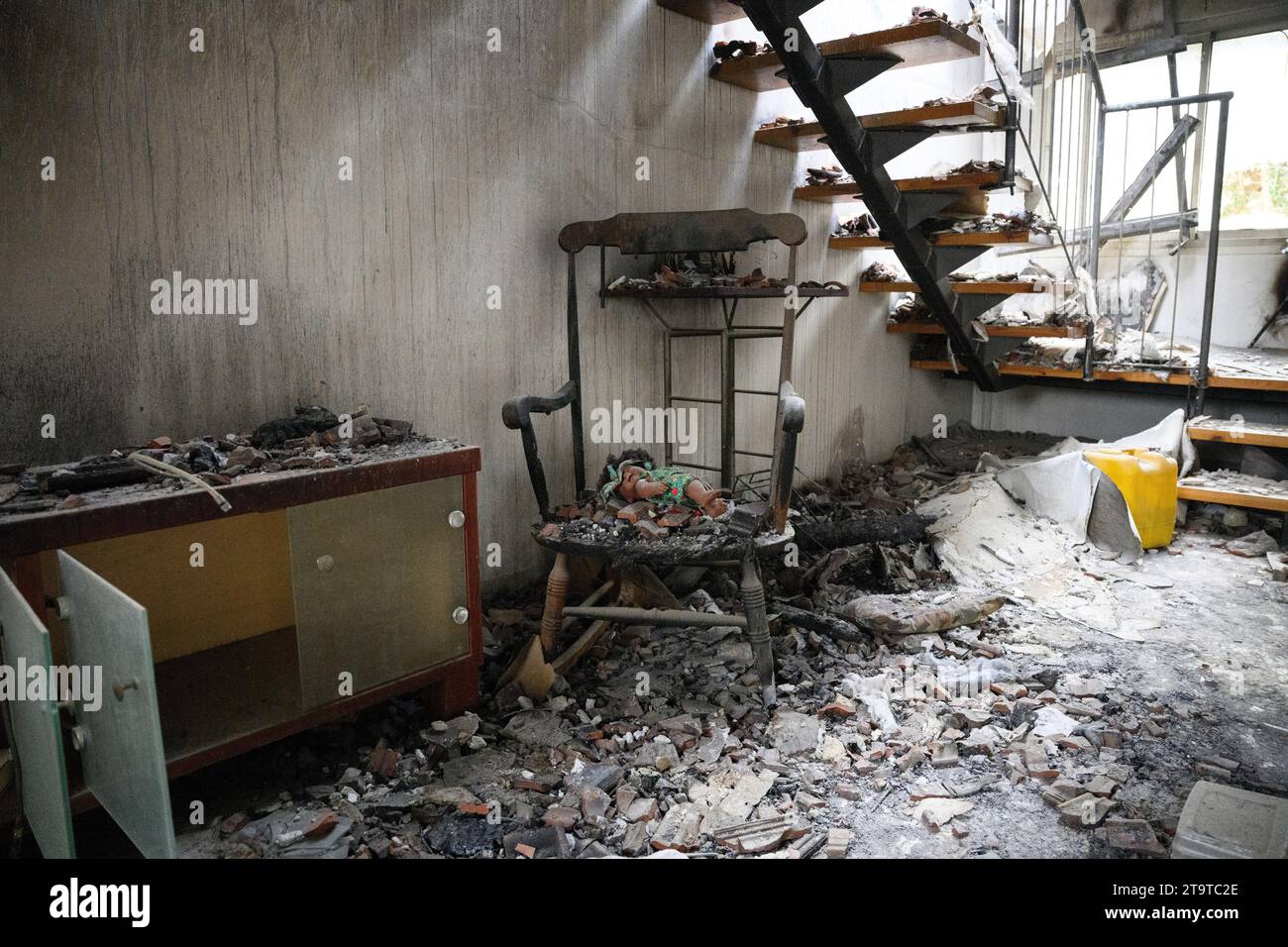 Beeri, Israel. 27th Nov, 2023. A doll lies on a rocking chair in a ...