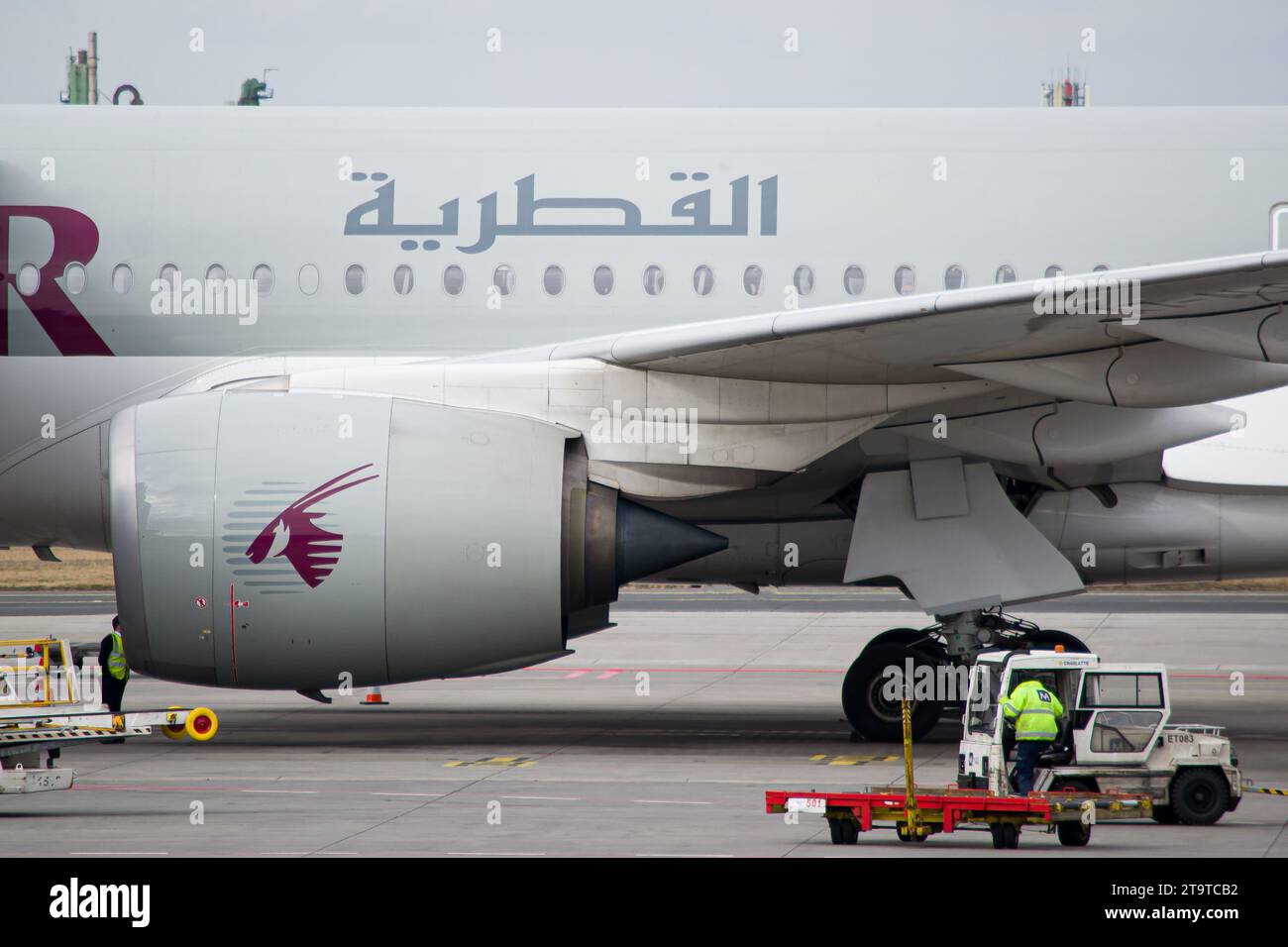 Qatar Airways Airbus A350-900 parked at the gate in Prague. Engine and ...