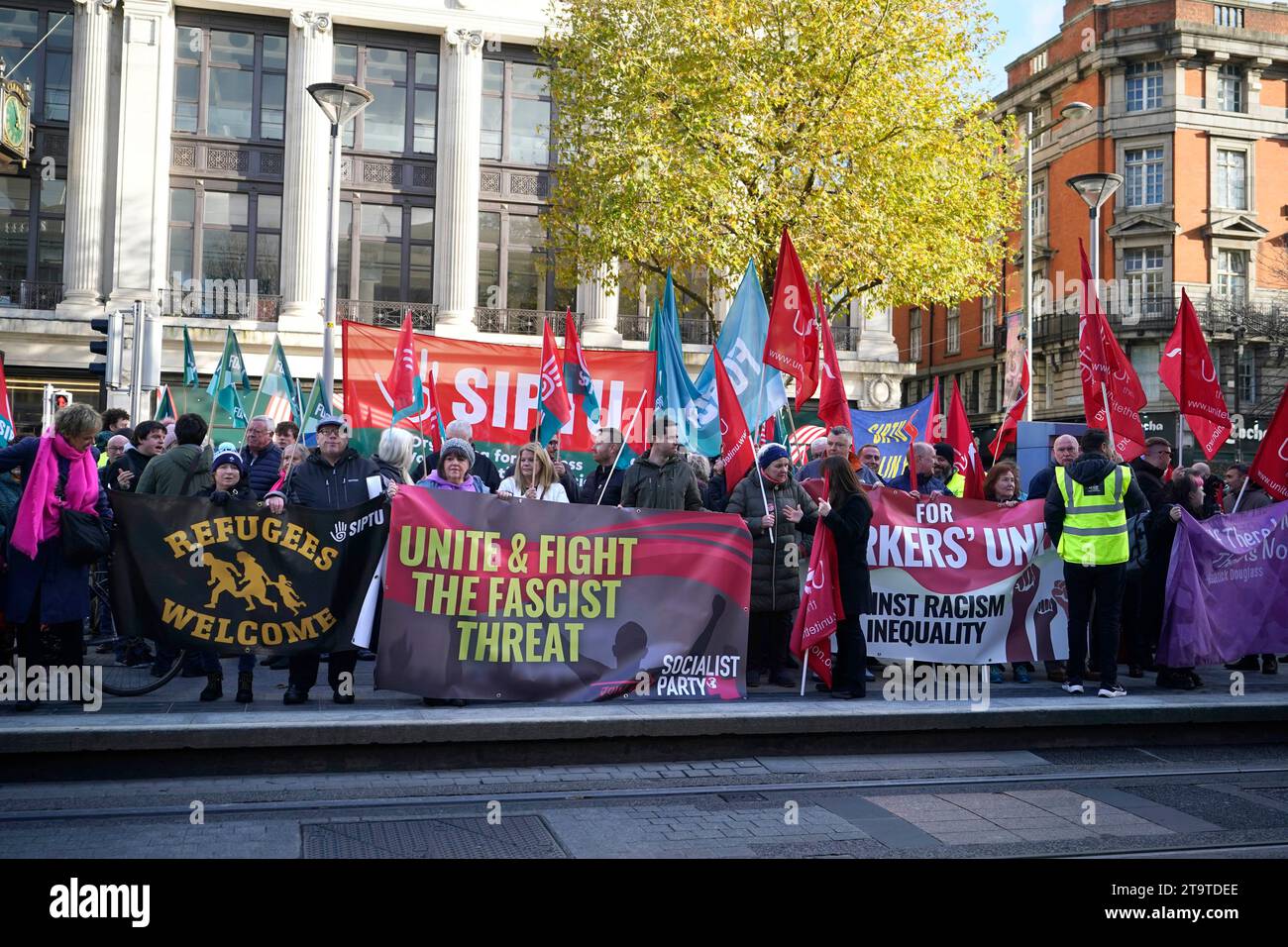 Trade unionists and demonstrators gather on O'Connell Street in Dublin ...