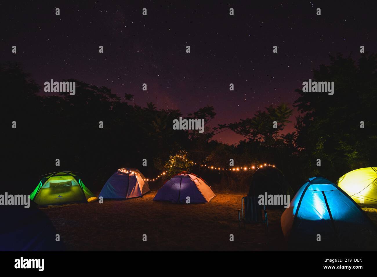 Camping at night with sky full of stars Stock Photo - Alamy