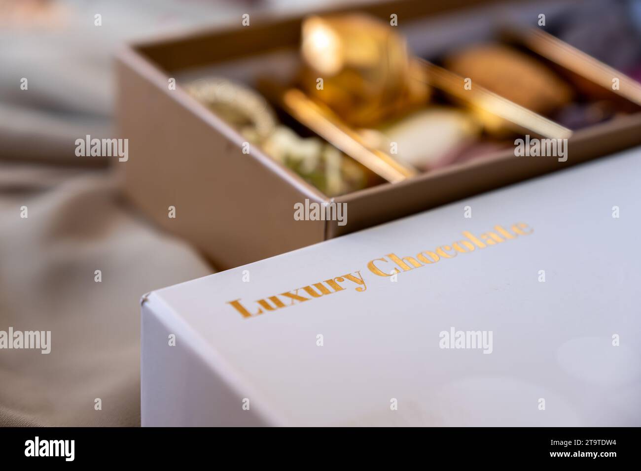 Chocolate box with golden words luxury chocolate with mock up space and ...