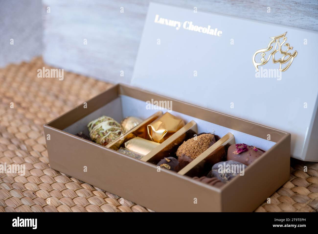 Chocolate box with golden words luxury chocolate with mock up space and ...