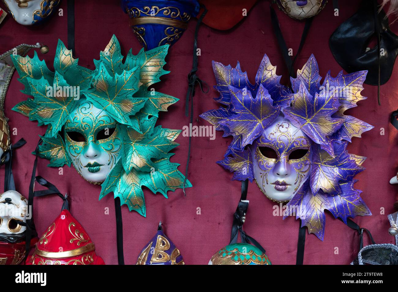 Colorful theatrical masks with full face, mouth, nose and eyes and a ...