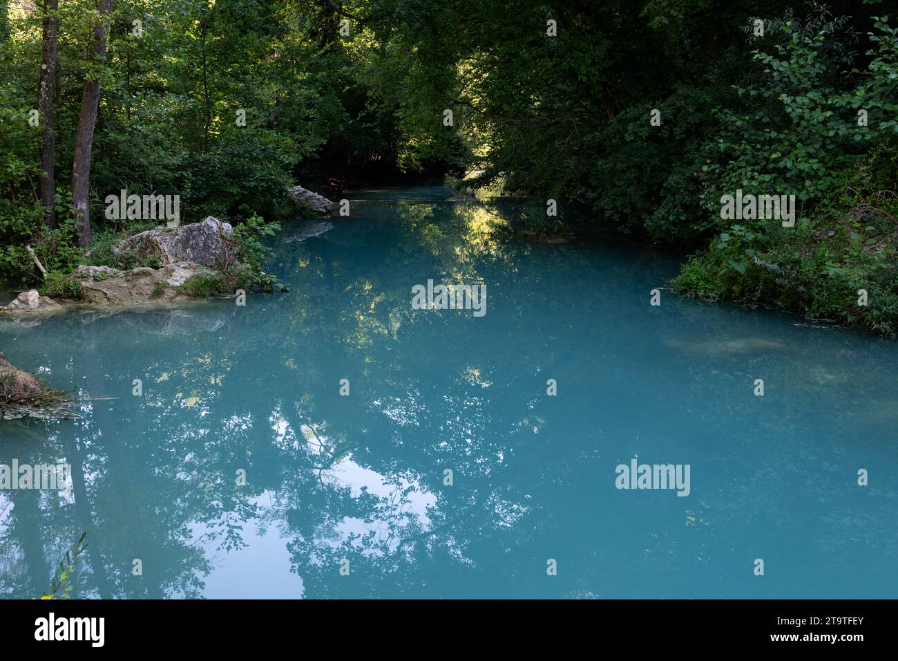 The milky waters of the Elsa River along the Diboratto Waterfall trail ...