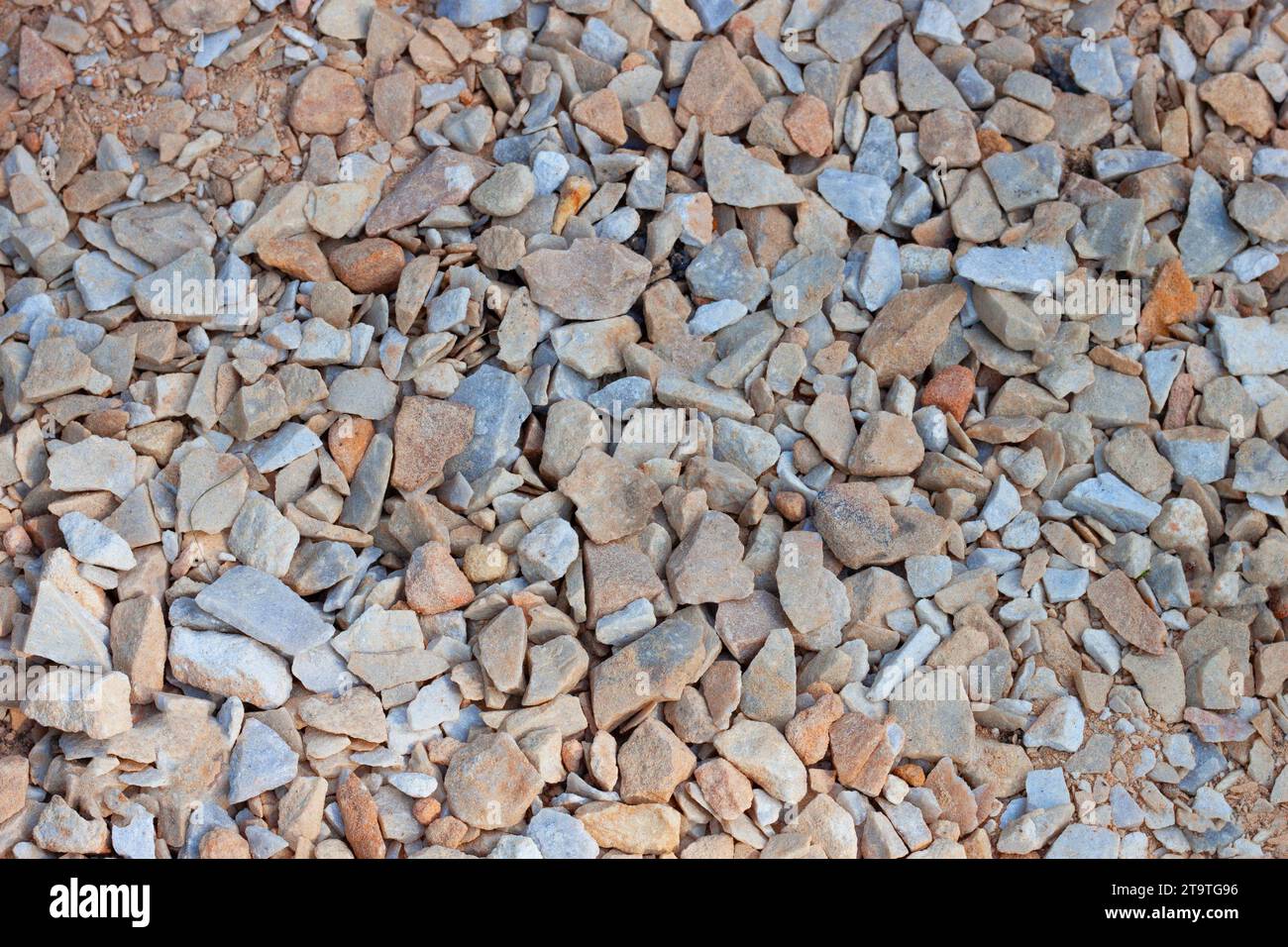 Crushed stone brown gray background texture, top view. Natural stone ...