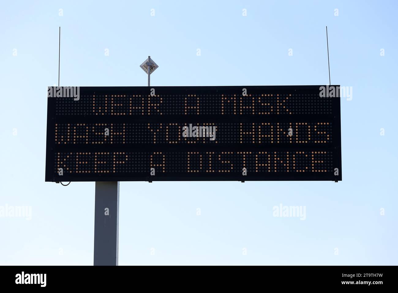 A Covid-19 Prevention message on an electronic road sign longside a ... A Covid-19 Prevention message on an electronic road sign longside a ...