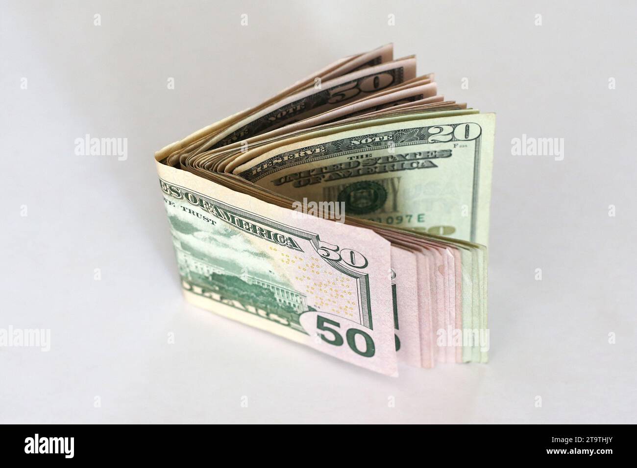 A wad of dollar notes Stock Photo - Alamy