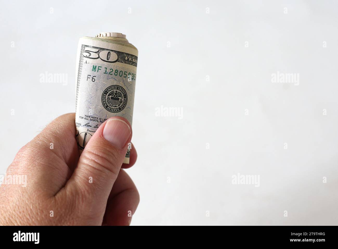 Holds currency notes hi-res stock photography and images - Alamy