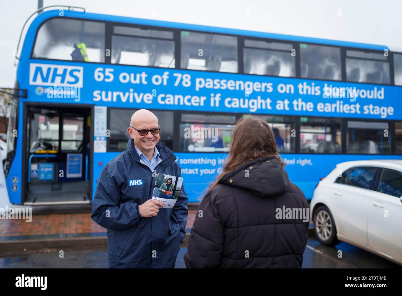 EDITORIAL USE ONLY GP Dan Cottingham speaks to a member of the public ...