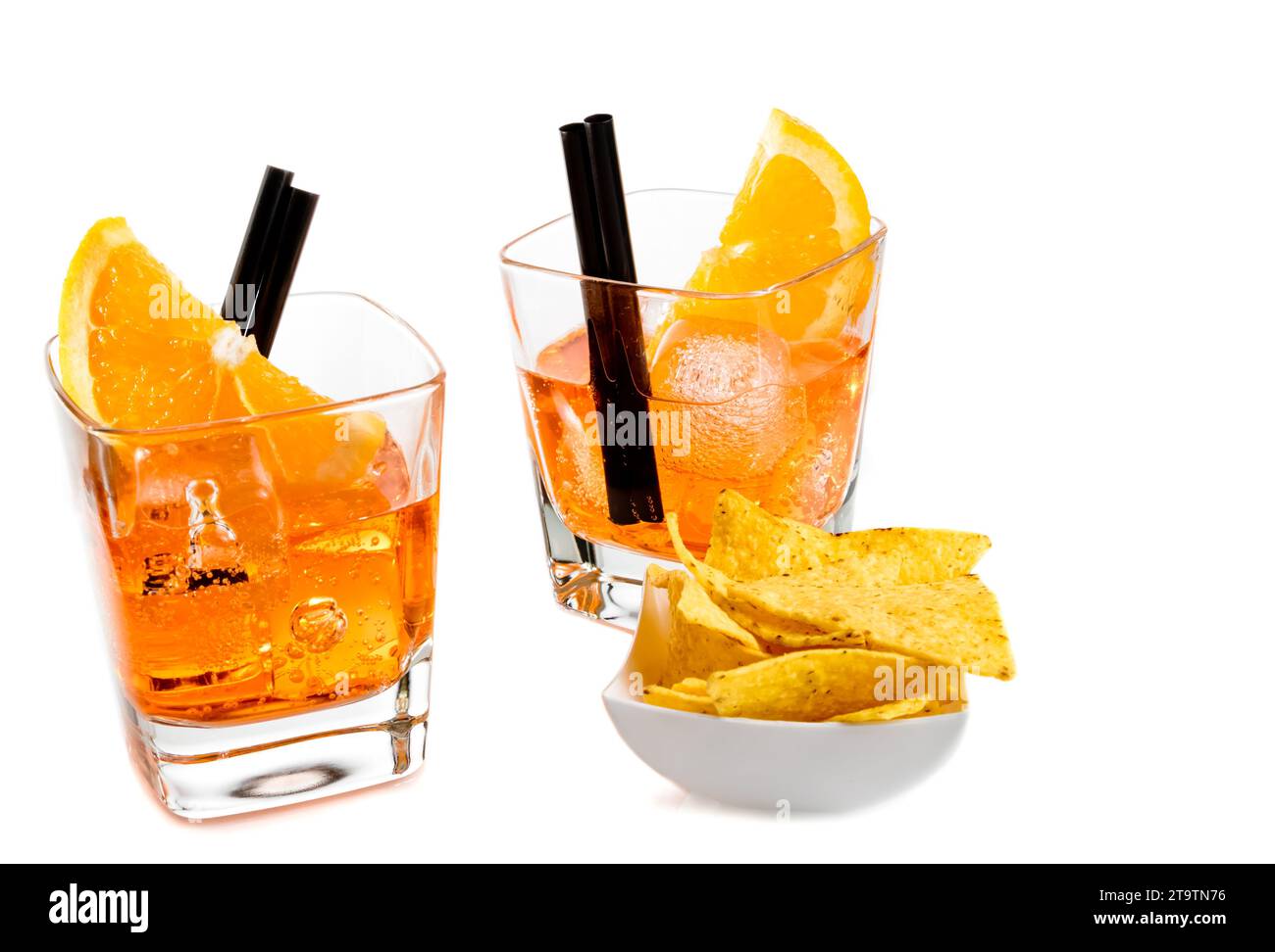 two glasses of spritz aperitif aperol cocktail with orange slices and ...