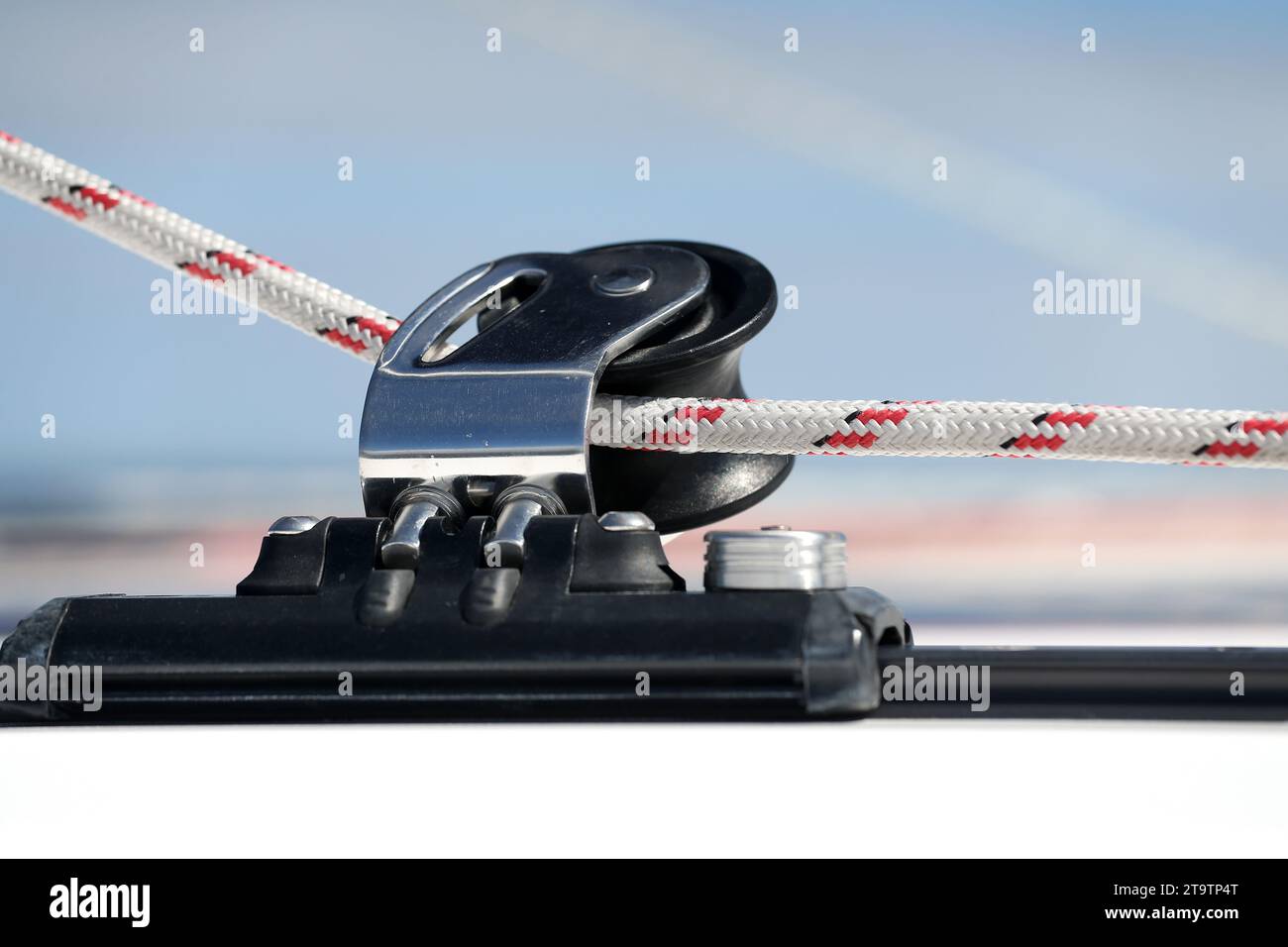 Sailing yacht equipment; sliding block with main sheet rope Stock Photo ...