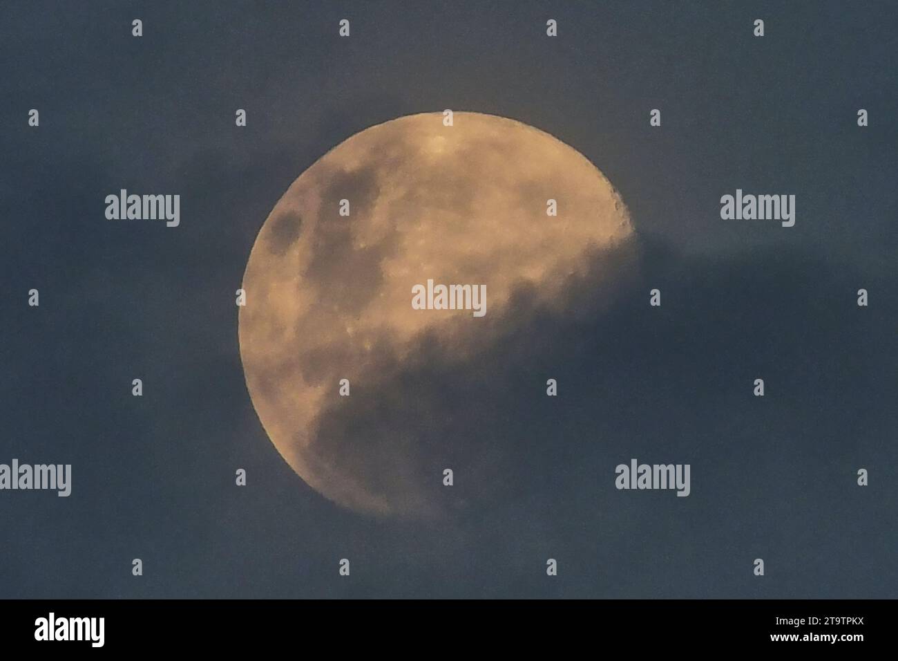 Beautiful and romantic moon growing in the universe on a clear night ...
