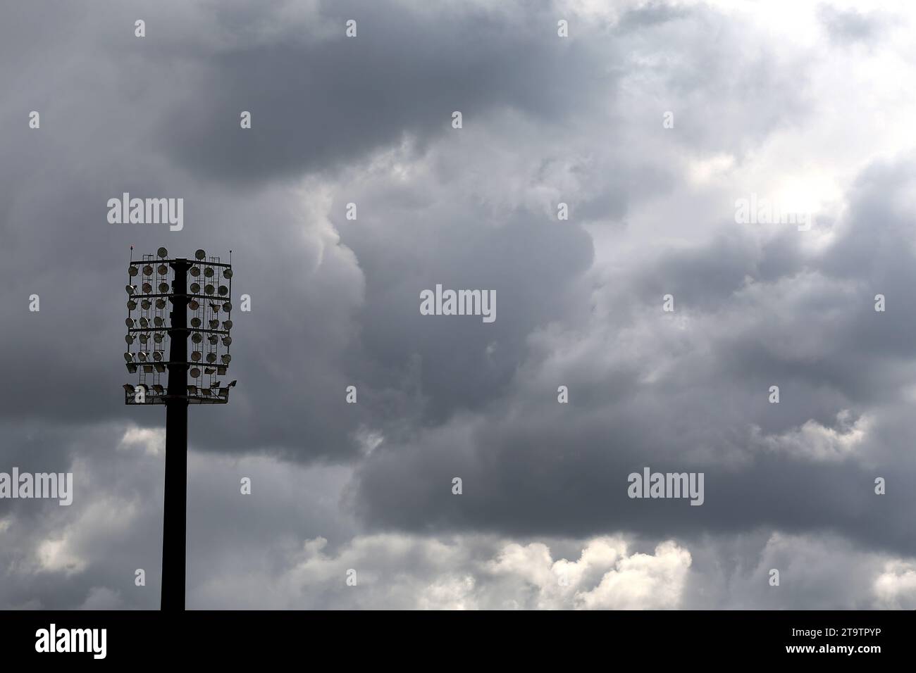 General view of a stadium flood light against an overcast sky Stock ...