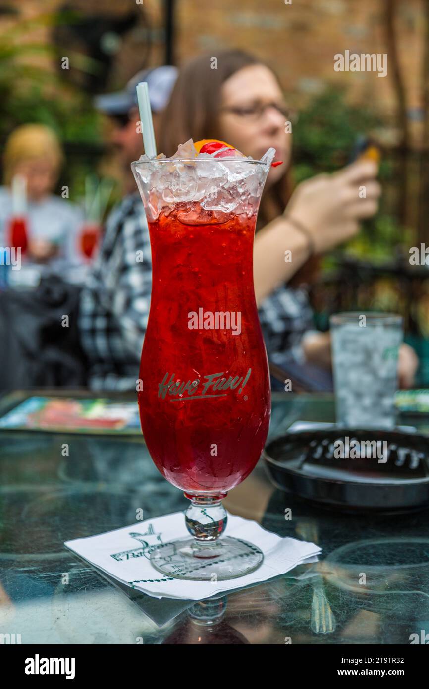 Famous Hurricane mixed drink on a table in the courtyard at Pat O ...