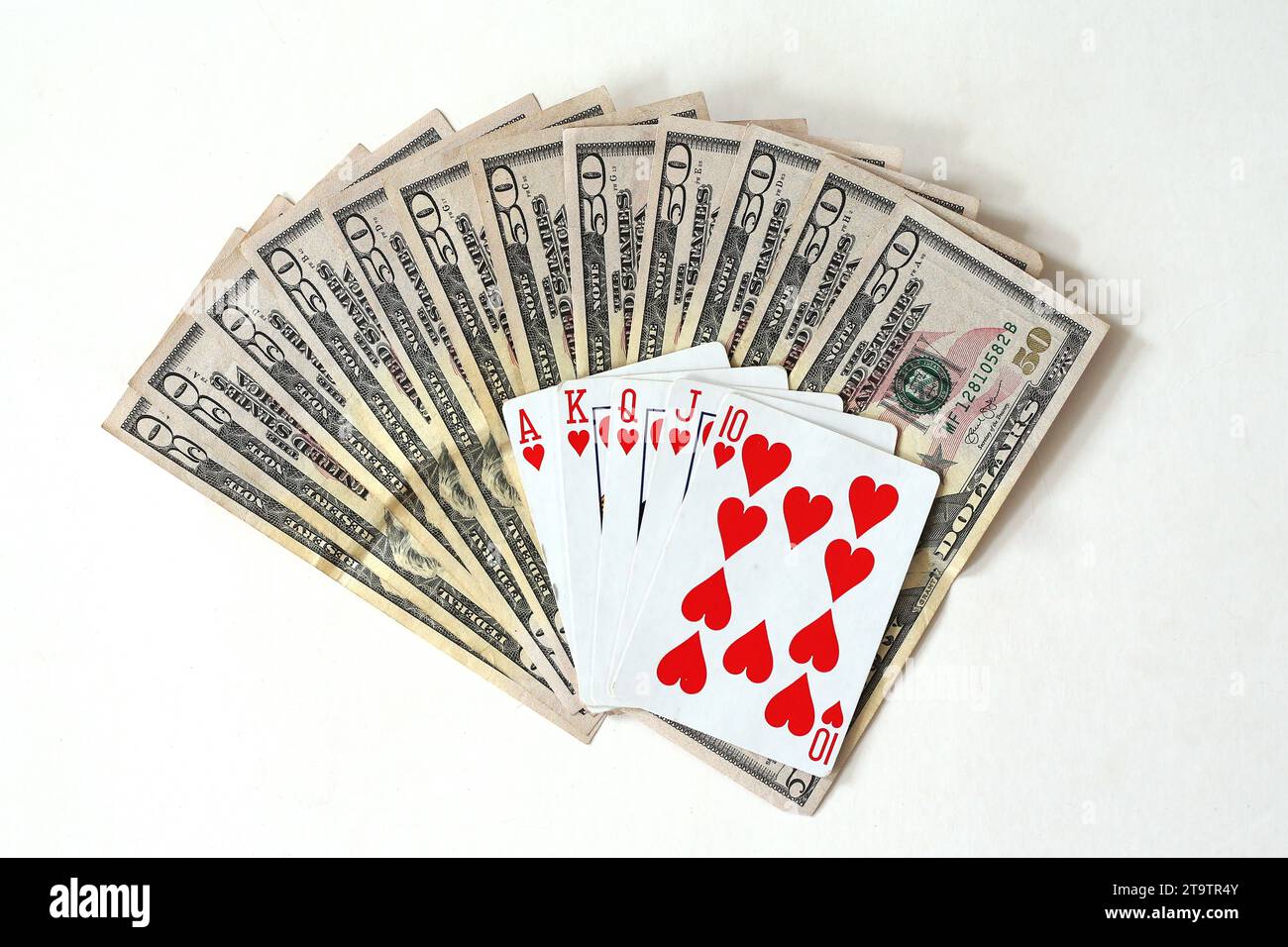 A General view of a Fan of Dollar money notes and a Full house of ...