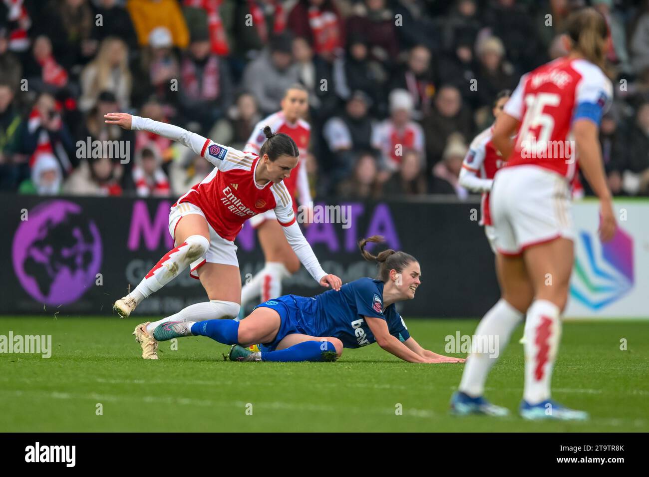 Emma Harries of West Ham Women is tackled by Lotte Wubben-Moy of ...