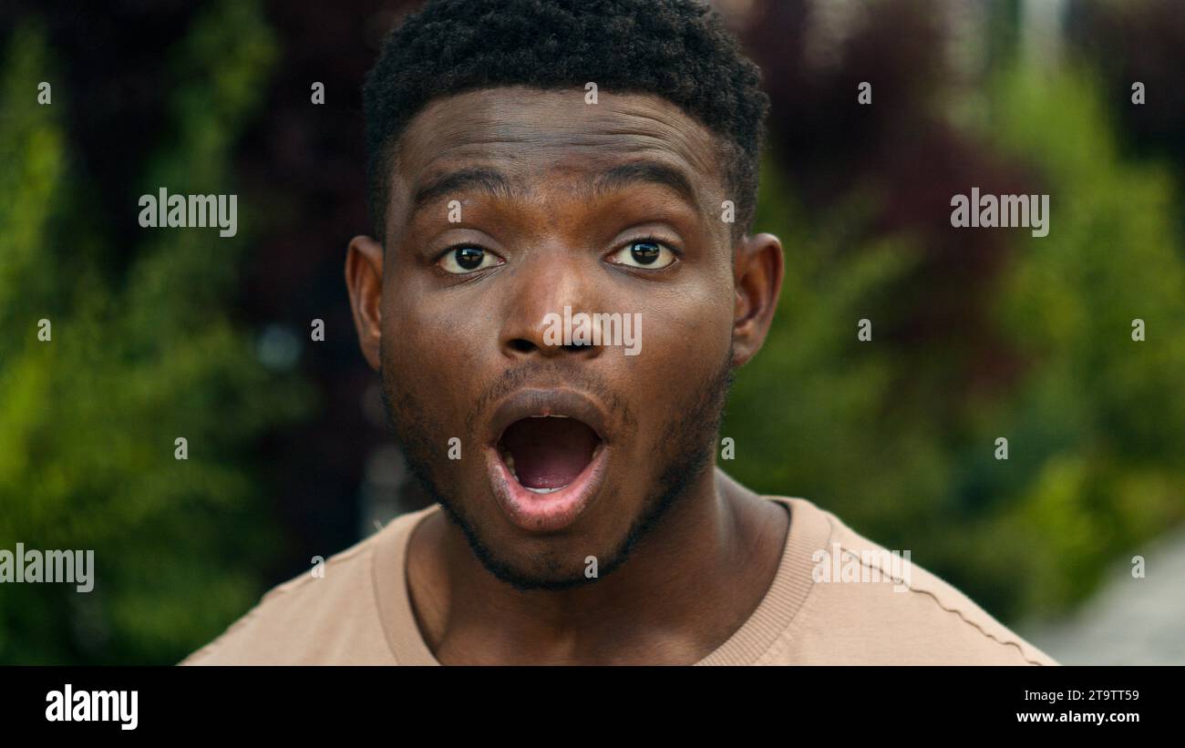 Close up biracial person open mouth wide with shock amazing reaction ... Close up biracial person open mouth wide with shock amazing reaction ...