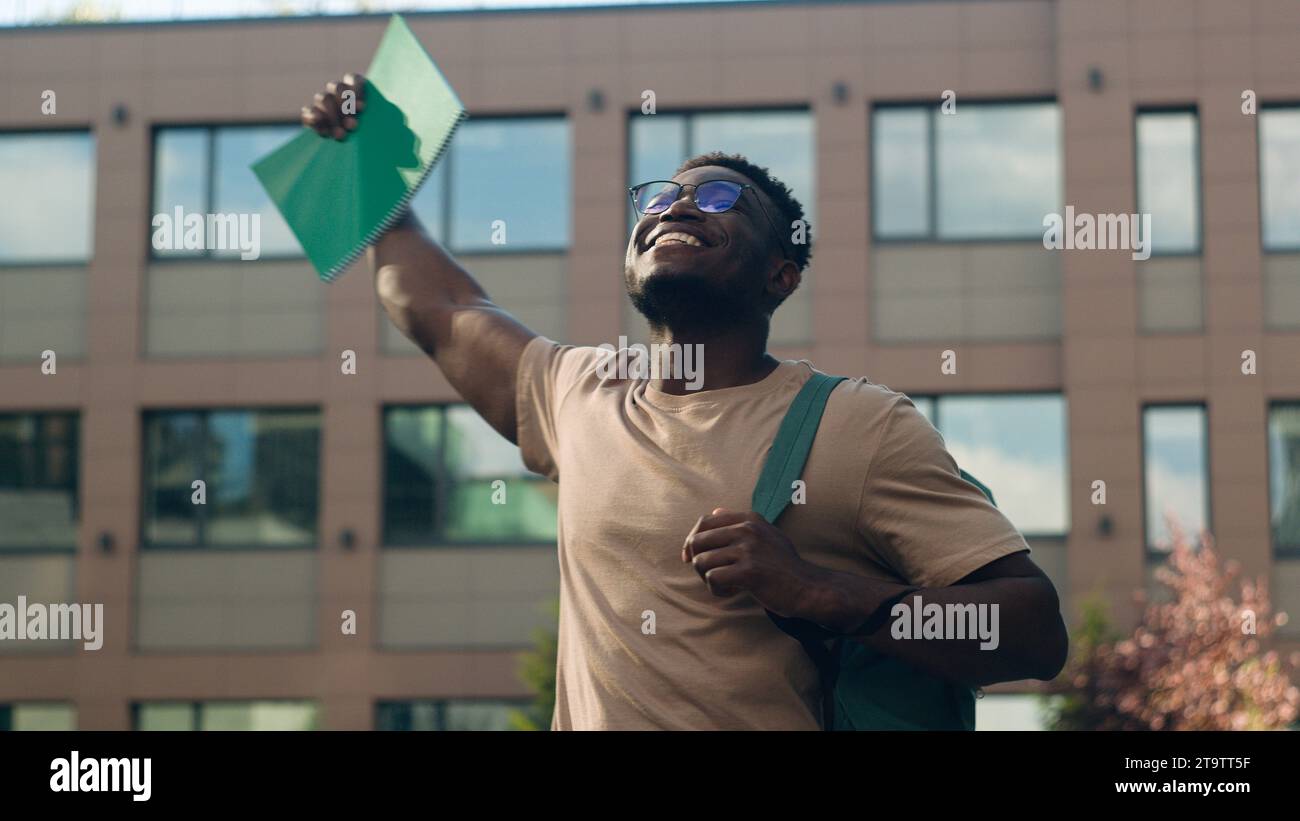 Overjoyed biracial male student guy high school pupil African American ...