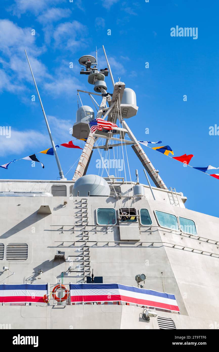 Flags fly from the bridge of the USS Jackson LCS-6 Independence class ...