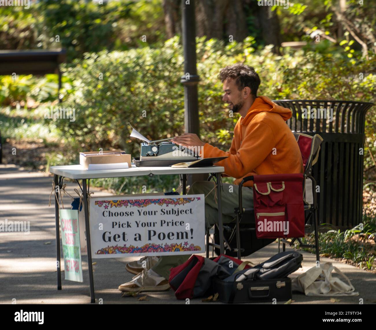 man writing poems on a typewriter in Forsyth Park Savannah Georgia ...