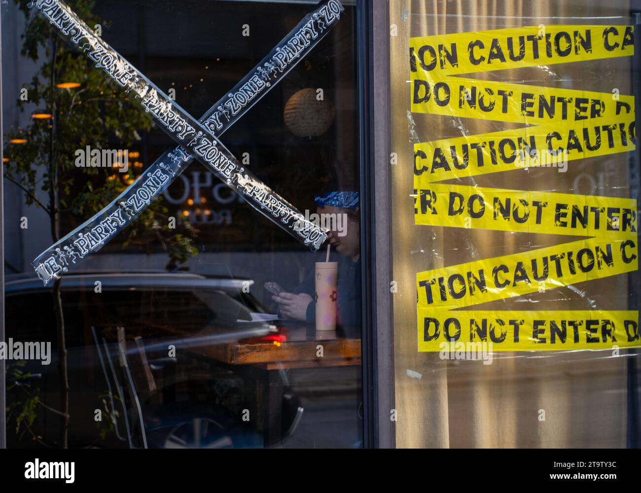 Party zone sign in window of a restaurant in downtown Savannah Georgia ...