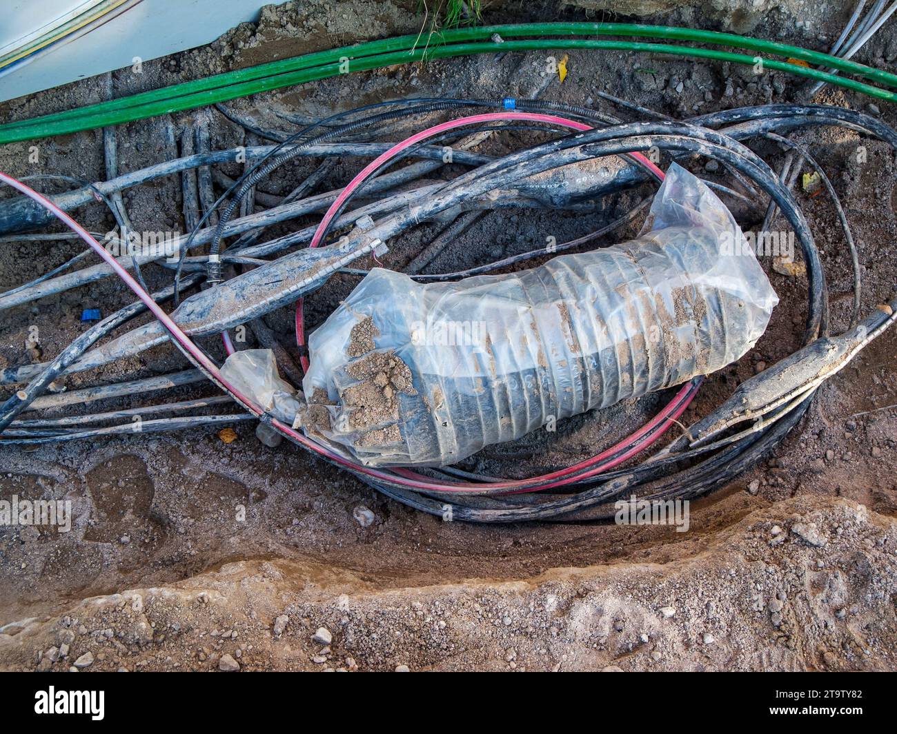 Vertical view of a tangle of cables in a construction pit Stock Photo ...