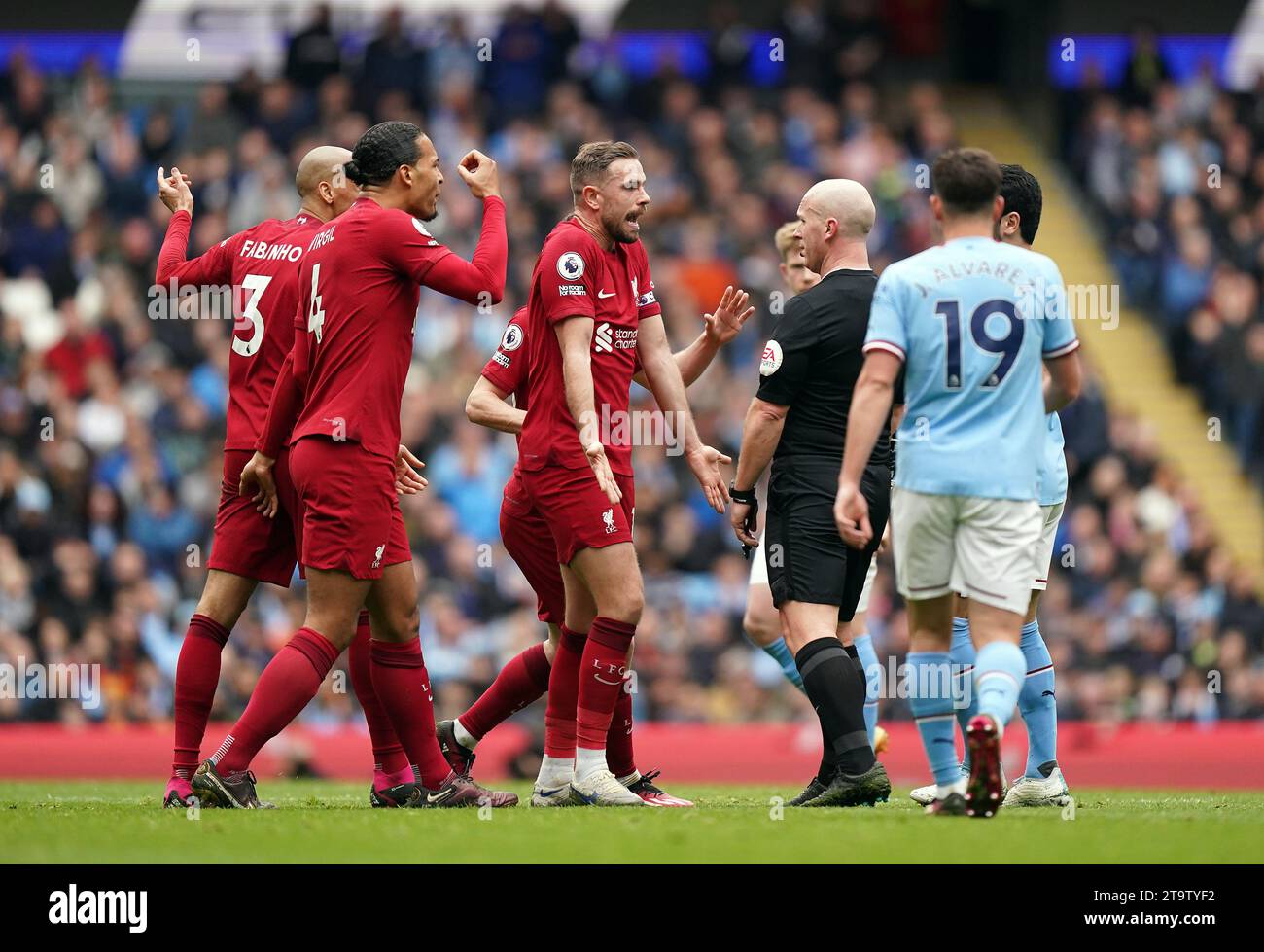 File photo dated 01-04-2023 of players surrounding referee Simon Hooper ...