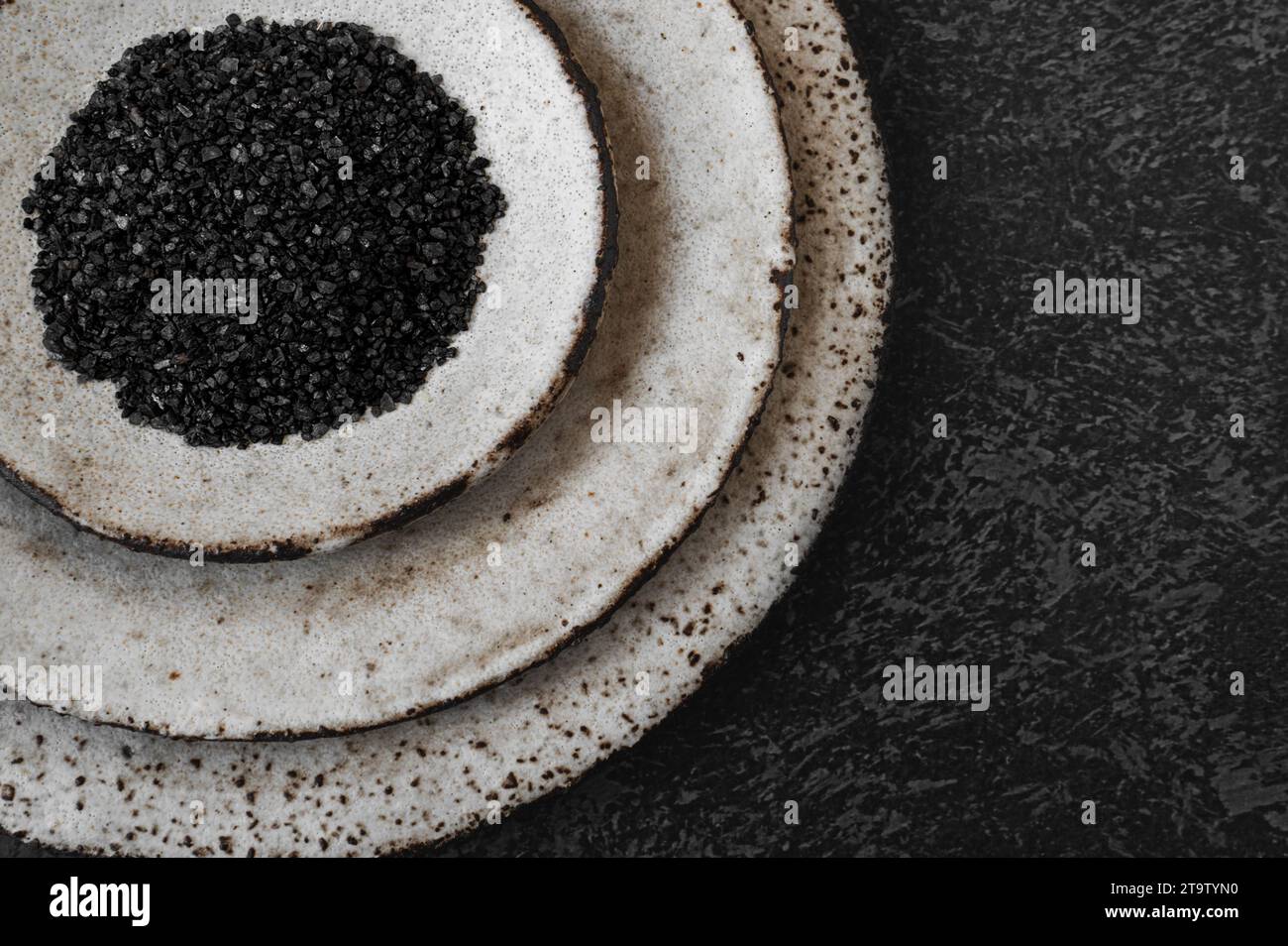 Coal salt. Black Himalayan salt. Russian Thursday rye salt. Top view of ...