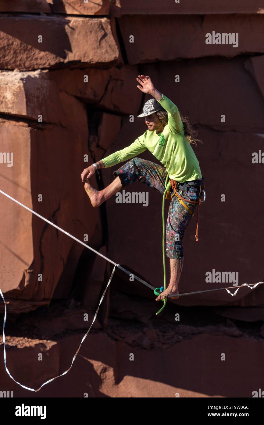 A freestyler balancing on one foot on a highline at the GGBY World ...