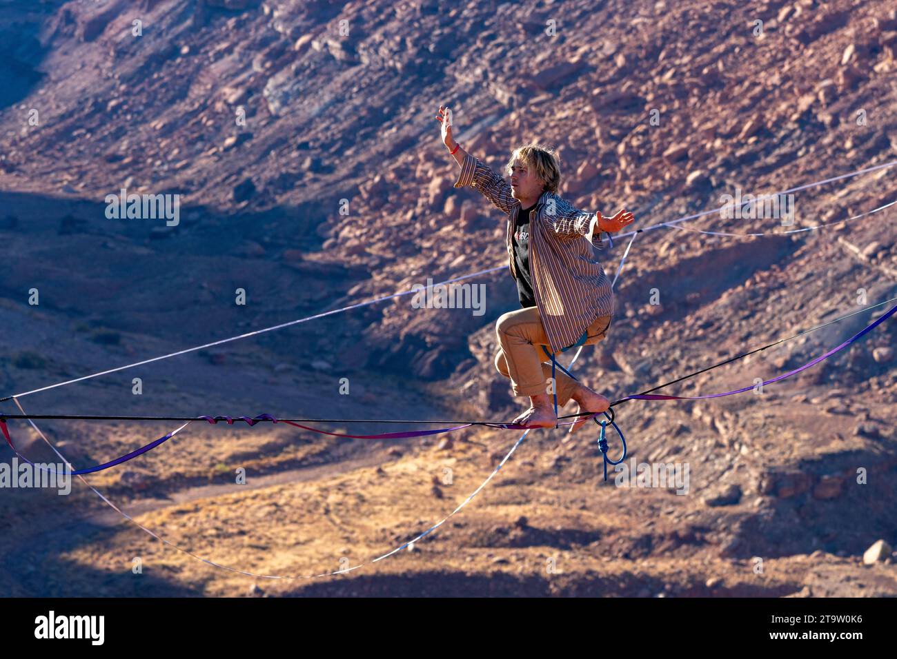 A man walking a highline at the GGBY World Highline Festival in Mineral ...