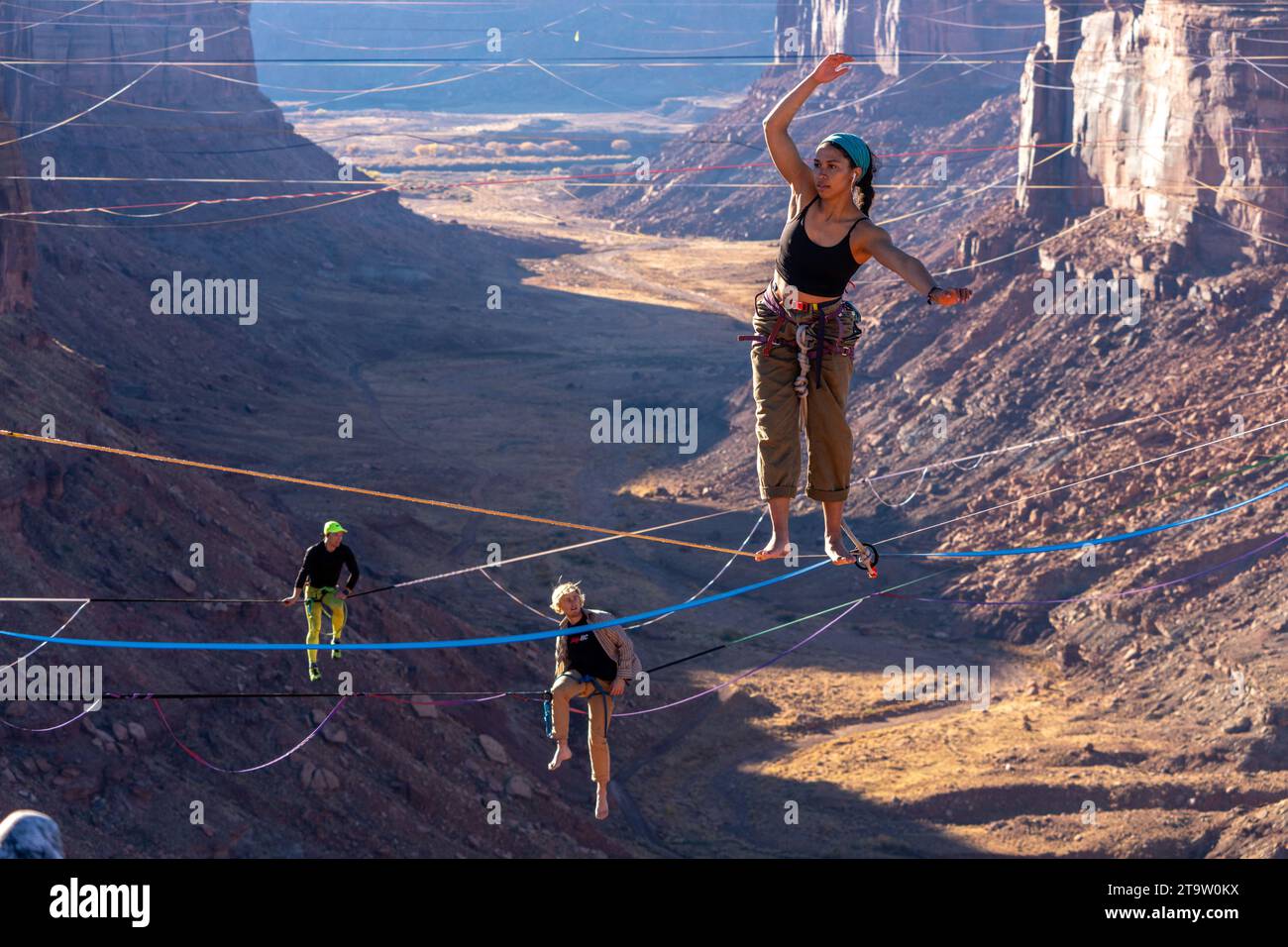 Three people on highlines at the GGBY World Highline Festival 500 feet ...